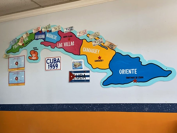 This vibrant map isn't just decoration - it's a visual promise of the authentic regional Cuban flavors coming your way.