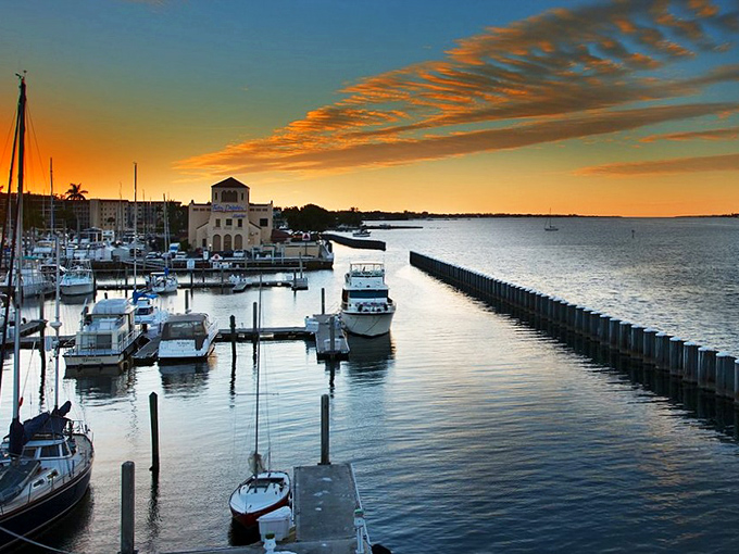The marina at sunset captures that perfect moment when boat owners temporarily forget about maintenance costs and just enjoy the view.