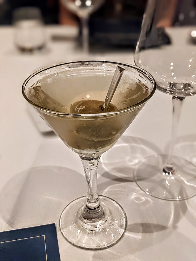 A proper martini—cold enough to give you brain freeze but strong enough to make you not care. James Bond would skip the mission for this.