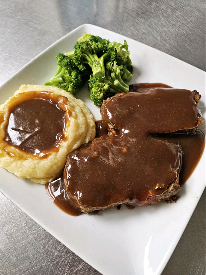 Meatloaf and mashed potatoes swimming in rich gravy – the kind of plate that makes you want to call your mother and apologize for ever complaining.