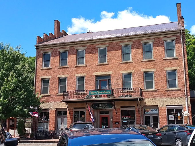 The three-story Medberry Marketplace anchors the village with its impressive brick facade and authentic 1800s commercial architecture.