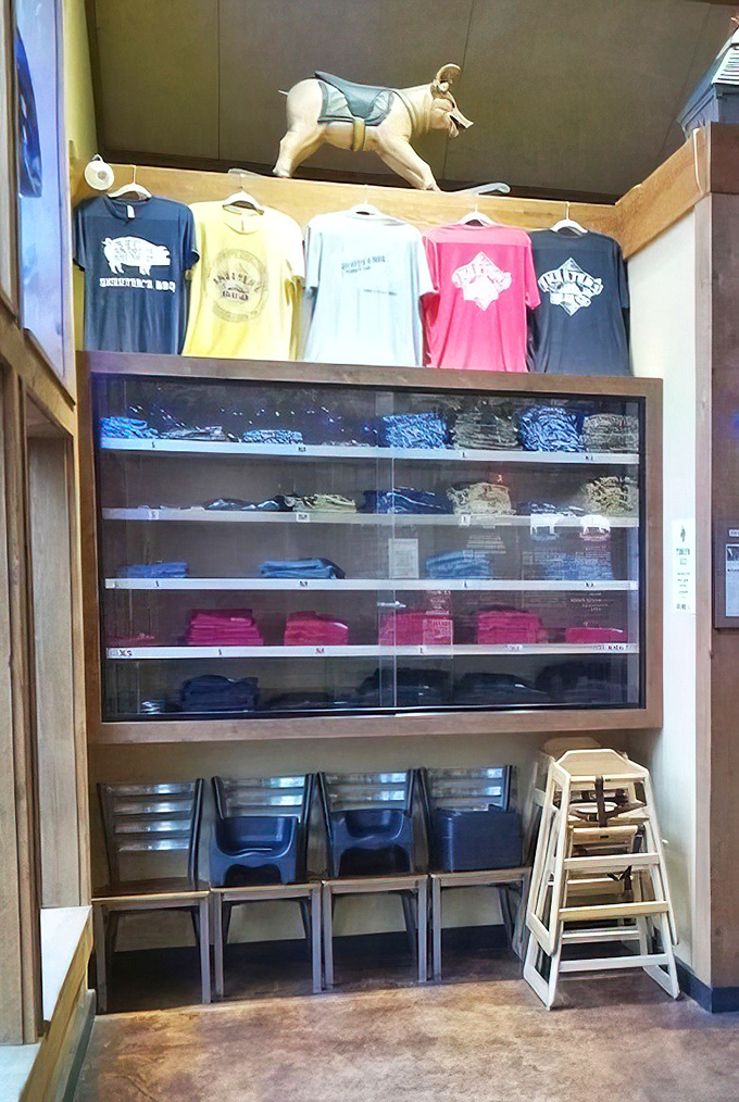 The merchandise wall—because sometimes wearing the T-shirt is the only way to prove to friends you've found BBQ nirvana in central Pennsylvania.