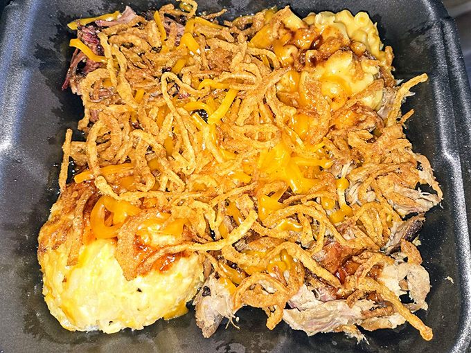 The aptly named "Mess Plate" is organized chaos at its most delicious. When your food needs to be contained in a sturdy black container, you're doing something right.