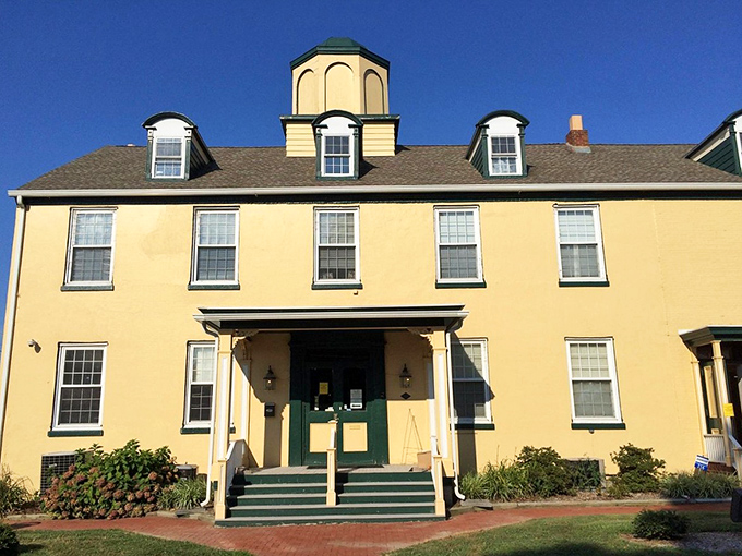 The Middletown Historical Society's yellow facade houses the stories that shaped this community. Those green doors welcome history buffs and curious minds alike.