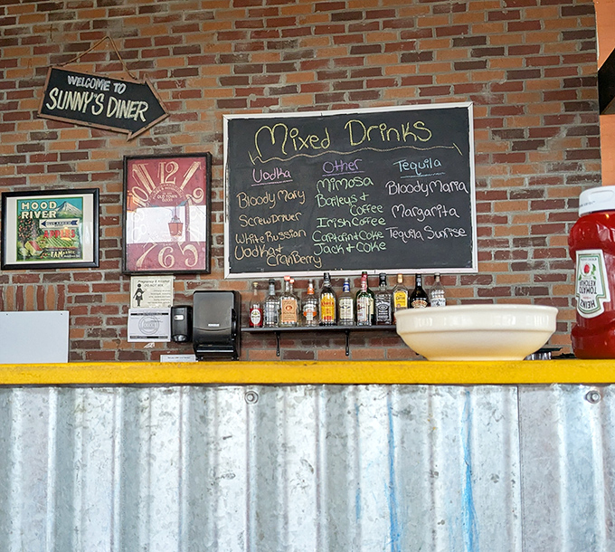 The chalkboard cocktail menu suggests that breakfast can indeed be a celebration. Who are we to argue with such wisdom?