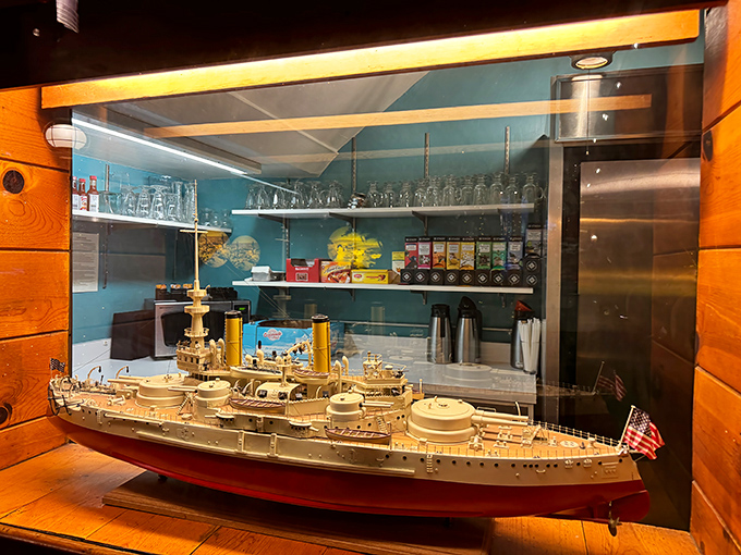 Not just decoration&mdash;this miniature battleship model represents the attention to detail that extends to everything they serve.