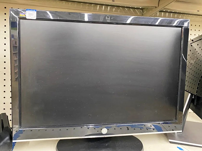 Electronics section: where vintage tech enthusiasts and practical shoppers converge. This flat screen is just waiting for its second act.