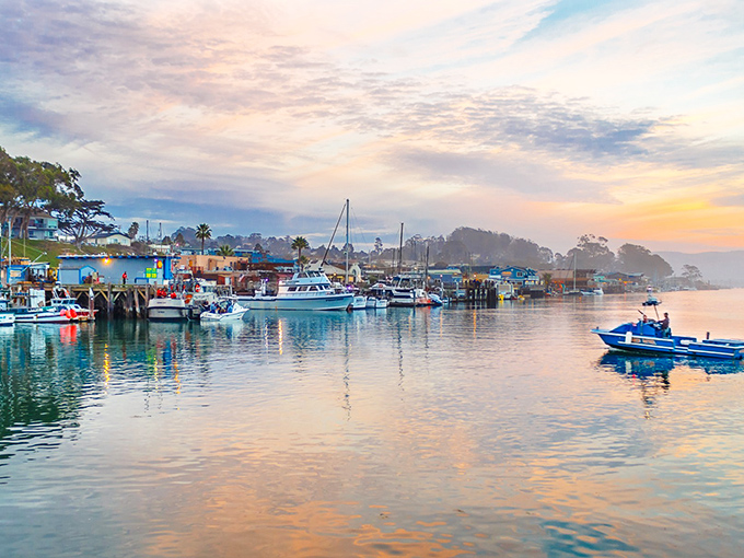 Harbor sunsets paint the sky in impossible colors while fishing boats rock gently at anchor.