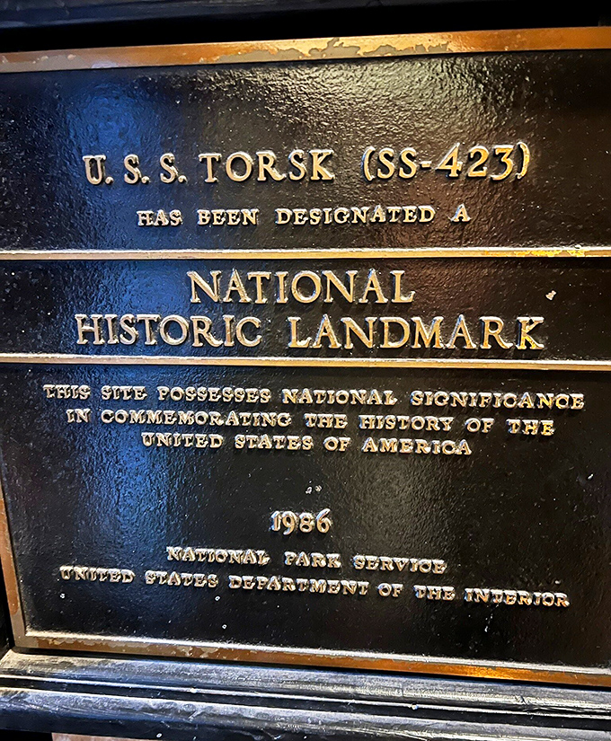 The National Historic Landmark plaque &ndash; official recognition that this metal fish with teeth earned its place in American history.