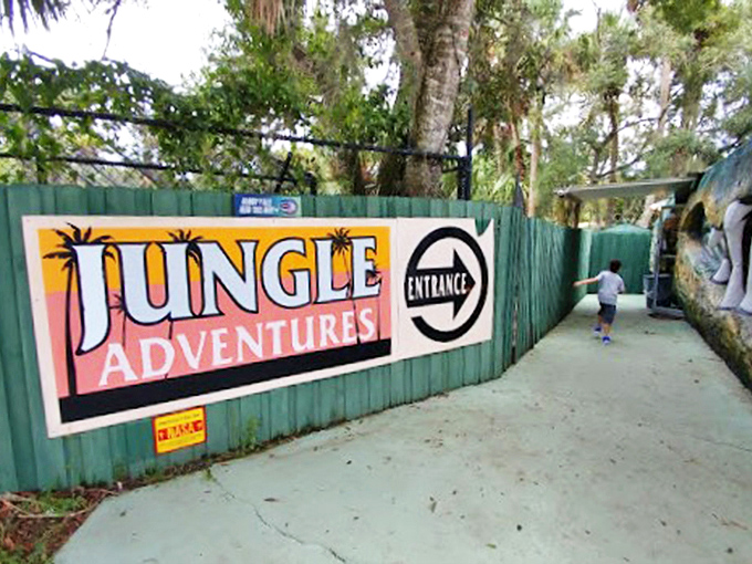 The "Jungle Adventures" sign promises exactly what it delivers&mdash;a slice of old Florida that theme parks can't replicate.