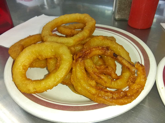 Onion rings that shatter like glass when bitten&mdash;the perfect crispy-to-onion ratio that chain restaurants have tried to replicate for decades.