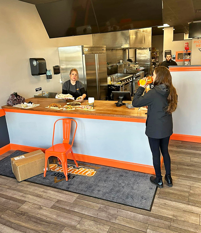 Open kitchen design lets diners witness the culinary magic happening, building anticipation with every sizzle and flip.