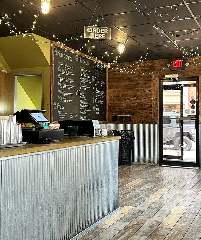 The counter where dreams become orders and orders become reality. String lights overhead like culinary constellations guiding you home.