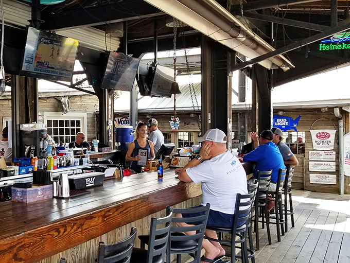 The outdoor bar: where the breeze carries salt air, cold beer flows freely, and life's problems seem delightfully distant.