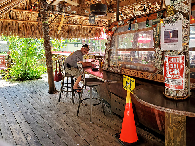 The outdoor tiki bar whispers "vacation mode activated" even when you're just grabbing lunch on Tuesday.