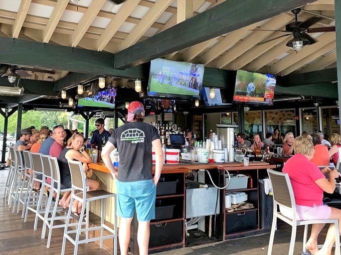 The outdoor bar&mdash;where watching sports meets watching boats, and nobody's checking their email. Paradise found.