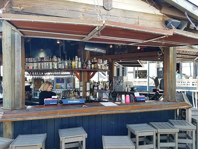 The outdoor bar captures that perfect "toes in the sand, drink in hand" coastal vibe without actually requiring you to shake sand from your shoes.