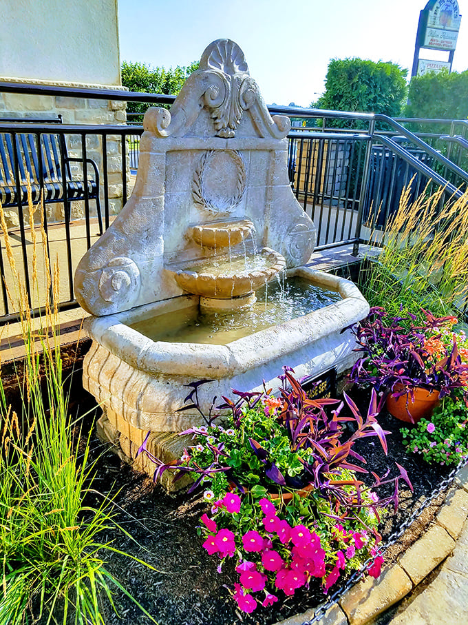 Even the outdoor fountain adds Italian charm&mdash;a tranquil water feature surrounded by vibrant flowers creates a moment of Tuscan-inspired serenity.