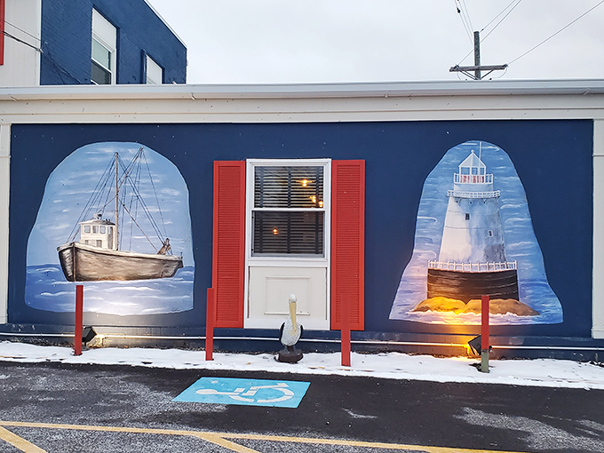 Maritime murals transform this Ohio building into a coastal fantasy, with lighthouses and fishing boats that set the mood before you've even stepped inside.