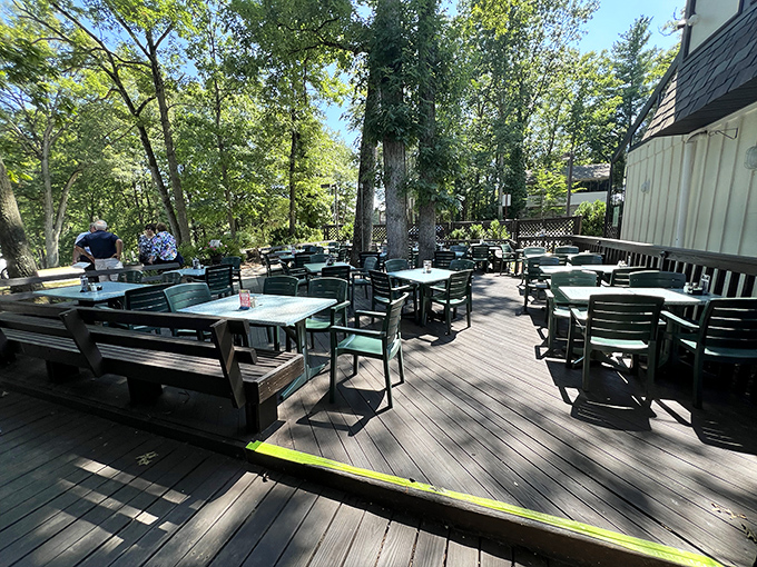 Outdoor deck dining where fresh air enhances every bite under Pennsylvania's beautiful canopy of trees.