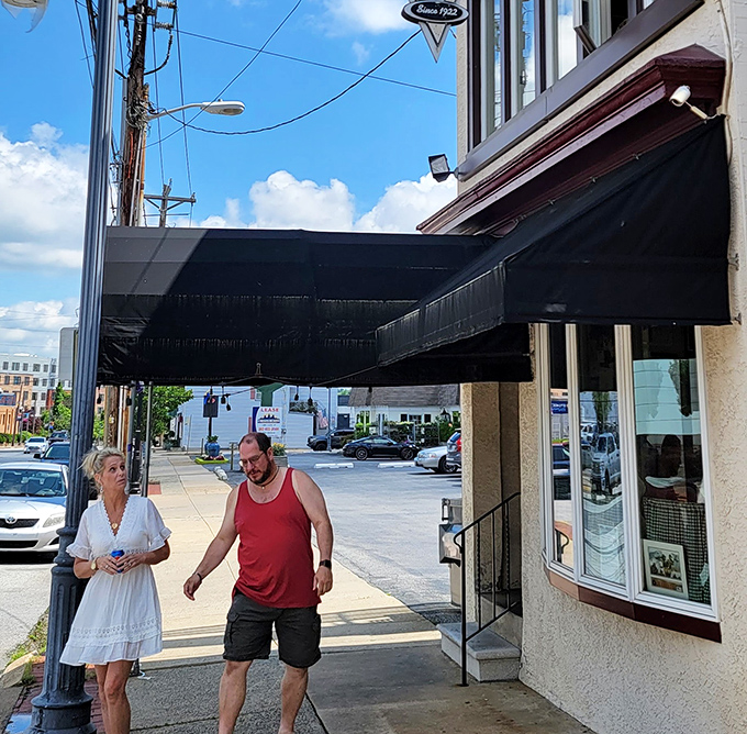 The sidewalk outside Kozy Korner&mdash;where satisfied customers emerge with that unmistakable "I just had the perfect breakfast" glow.
