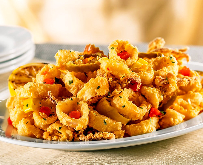Calamari that crackles with each bite, punctuated by spicy peppers. The appetizer that ruins all other calamari for you forever.