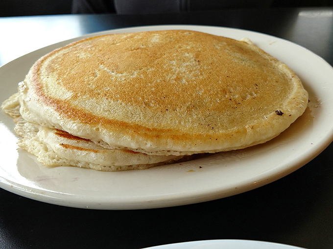 Pancakes so perfectly golden they look like they've been airbrushed. The breakfast equivalent of a supermodel, but more satisfying.