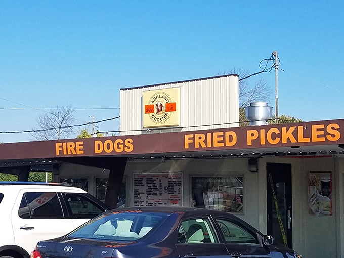 "FIRE DOGS" and "FRIED PICKLES" announce themselves in no-nonsense lettering. This place doesn't need Instagram filters&mdash;it's authentically itself. 