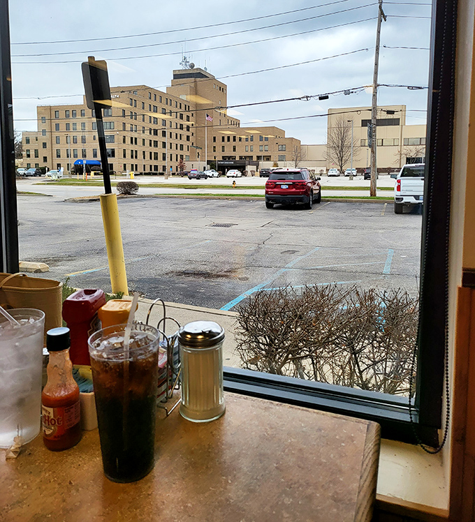 A view that reminds you that sometimes the best culinary experiences happen in unassuming locations, just across from everyday America.