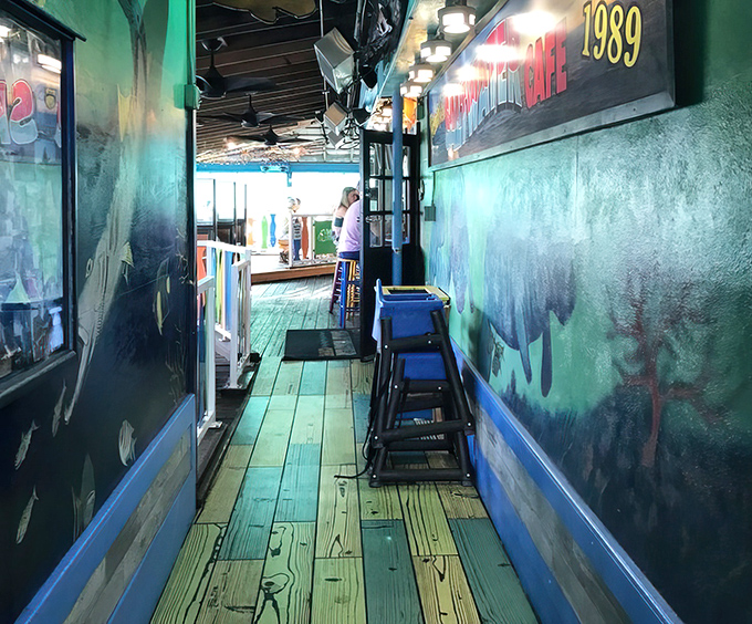 The pathway to paradise is painted turquoise. Follow this seafood yellow brick road to grouper sandwich glory.