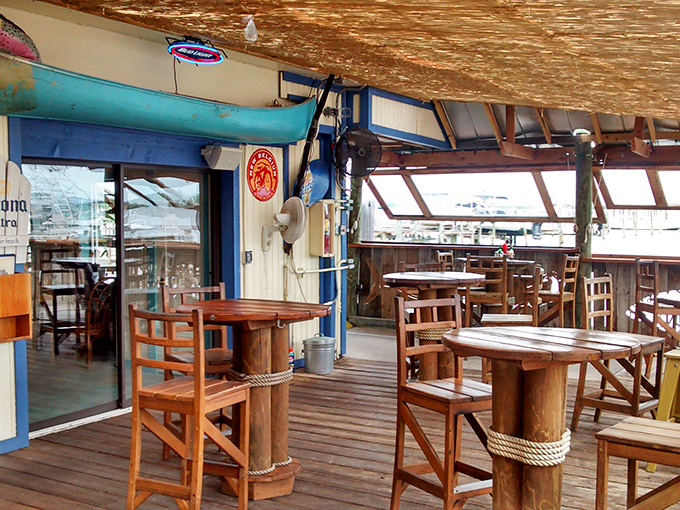 The patio doesn't just offer seating&mdash;it offers therapy with a view, where wooden tables and salt air heal whatever ails you.