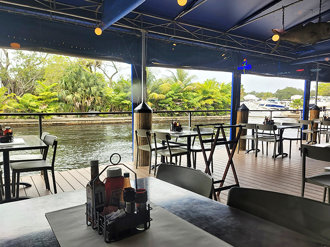 Waterside tables offer front-row seats to nature's aquatic highway, where boats parade past as you crack into dinner.