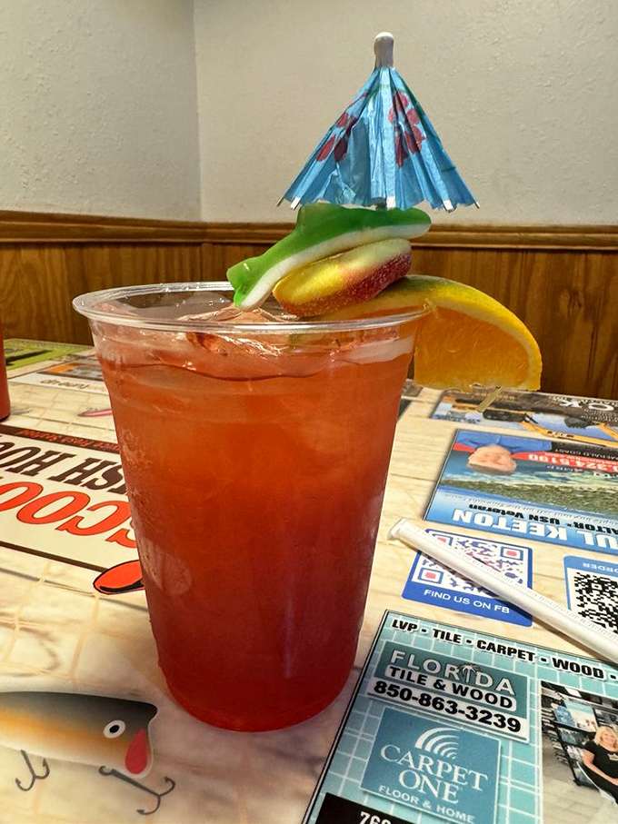 This isn't just a drink; it's Florida sunshine in a cup&mdash;fruity, refreshing, and adorned with enough garnish to qualify as a small fruit salad. 