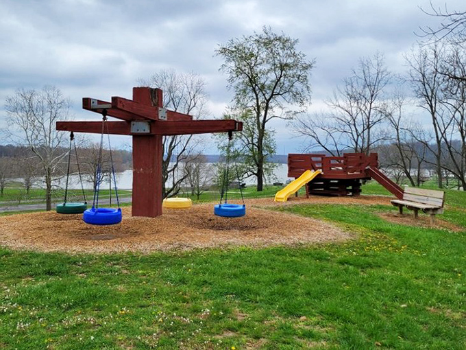 This playground with a lake view might just make adults wish they could shrink back to kid-size for an afternoon of carefree swinging.