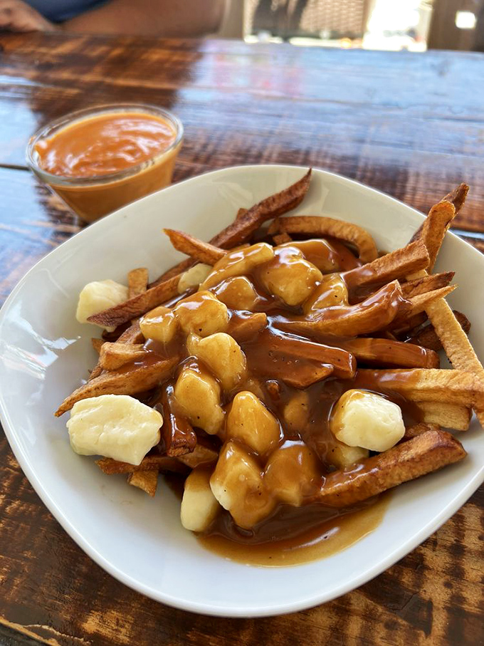 Poutine in Florida? These fries draped in gravy and cheese curds prove that cultural exchange programs between Canada and Florida are working beautifully.