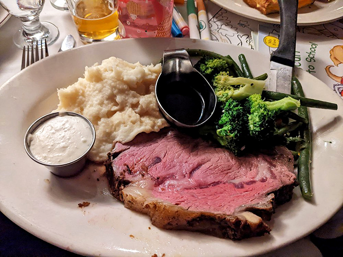 Prime rib so perfectly pink it belongs in a museum of meat masterpieces. The horseradish sauce stands ready for those brave enough.