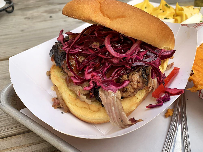 This pulled pork sandwich with pickled red onions is what happens when comfort food goes to finishing school&mdash;refined yet still soul-satisfying.