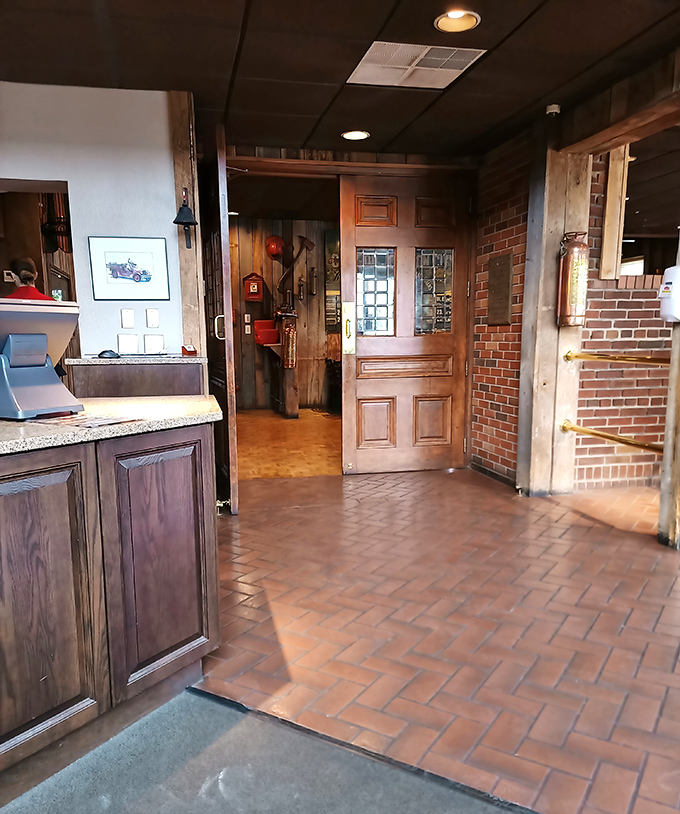 The entrance sets the tone immediately &ndash; brick, wood, and the lingering promise of hickory smoke welcomes you home.