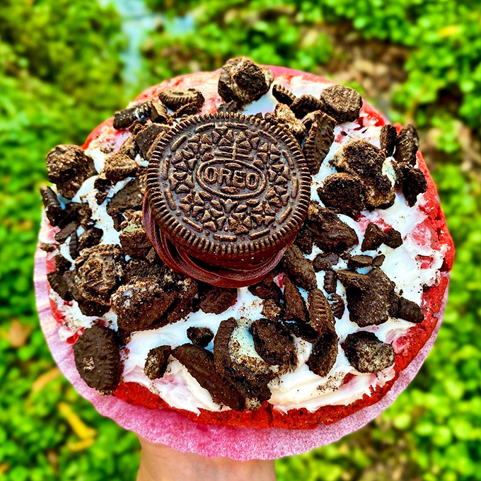 The Oreo cookie centerpiece isn't just decoration &ndash; it's the chairman of the board overseeing this red velvet revolution with creamy authority.