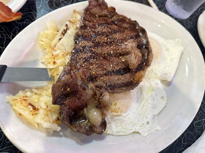 A ribeye steak and eggs that answers the eternal question: "Why choose between breakfast and dinner when you can have both?"