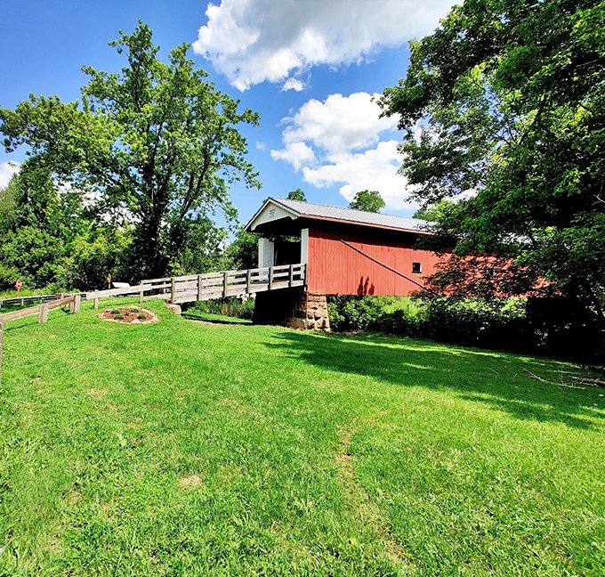 Summer greenery embraces the bridge like a warm hug from Mother Nature herself, complete and comforting.