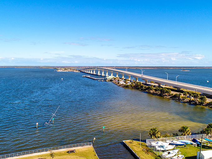 The causeway stretches across the blue expanse like a lifeline between worlds &ndash; Titusville on one side, natural Florida treasures on the other.