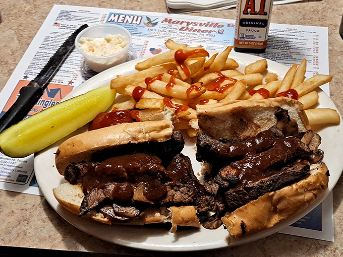 This isn't just a roast beef sandwich&mdash;it's a masterpiece of meat, bread, and fries that demands to be devoured.