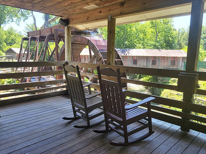 Two rocking chairs with a waterwheel view&mdash;nature's version of dinner and a show, minus the overpriced tickets.