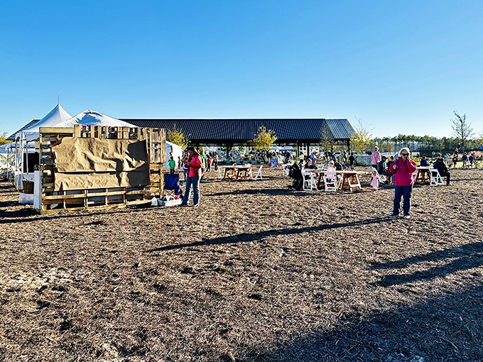 Beach sand mingles with market stands, creating the only shopping experience where flip-flops are always appropriate.