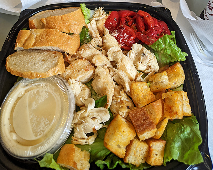 The chicken Caesar salad &ndash; where "eating healthy" and "eating happy" find common ground. Those croutons deserve their own fan club.