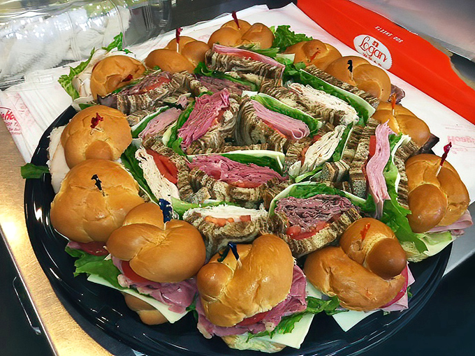 The sandwich catering tray&mdash;feeding a crowd with minimal effort and maximum appreciation. The circular arrangement practically guarantees everyone finds their perfect match.