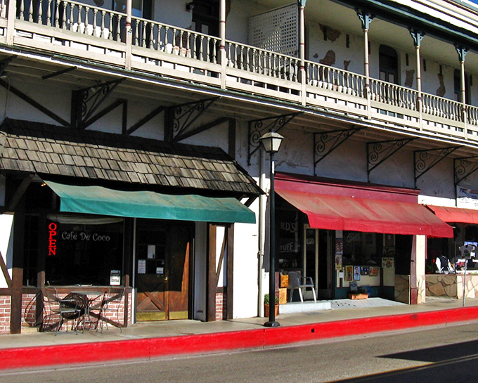 The historic balconies of downtown buildings offer a perfect perch for people-watching &ndash; a timeless small-town entertainment option.