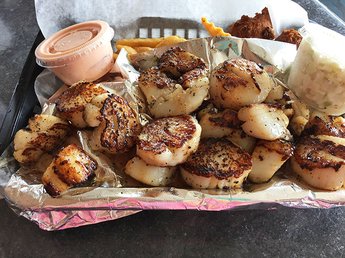 Scallops seared to golden perfection – like buttery ocean marshmallows that somehow taste like sunshine and happiness.
