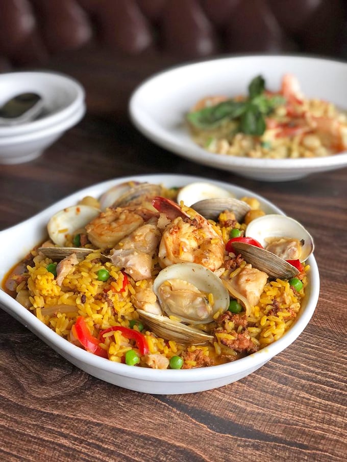 This seafood paella isn't just dinner&mdash;it's a Spanish vacation in a bowl, with each grain of saffron rice soaking up the essence of the sea.